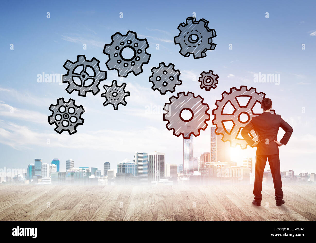 Cogwheel engine drawn on screen as symbol for teamwork and cooperation ...
