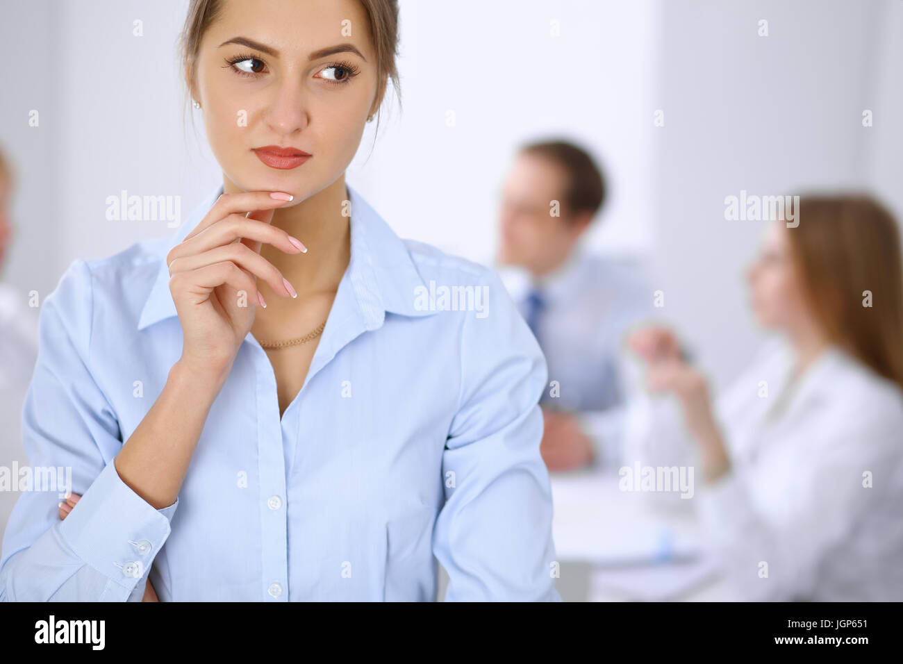 Beautiful business woman on the background of business people Stock ...