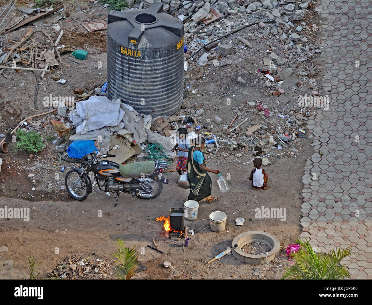 Life in poverty, street cooking Stock Photo - Alamy