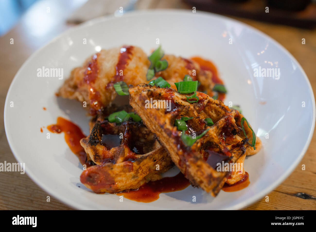 Kimchi Fried Chicken and Waffles Stock Photo - Alamy