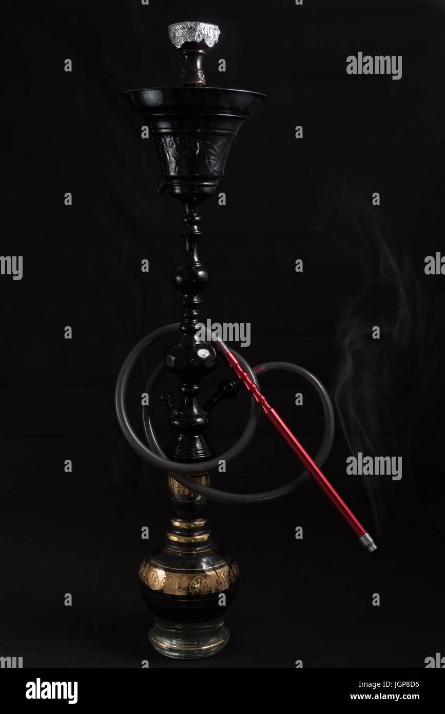 Tall Hookah pipe with black background Stock Photo - Alamy