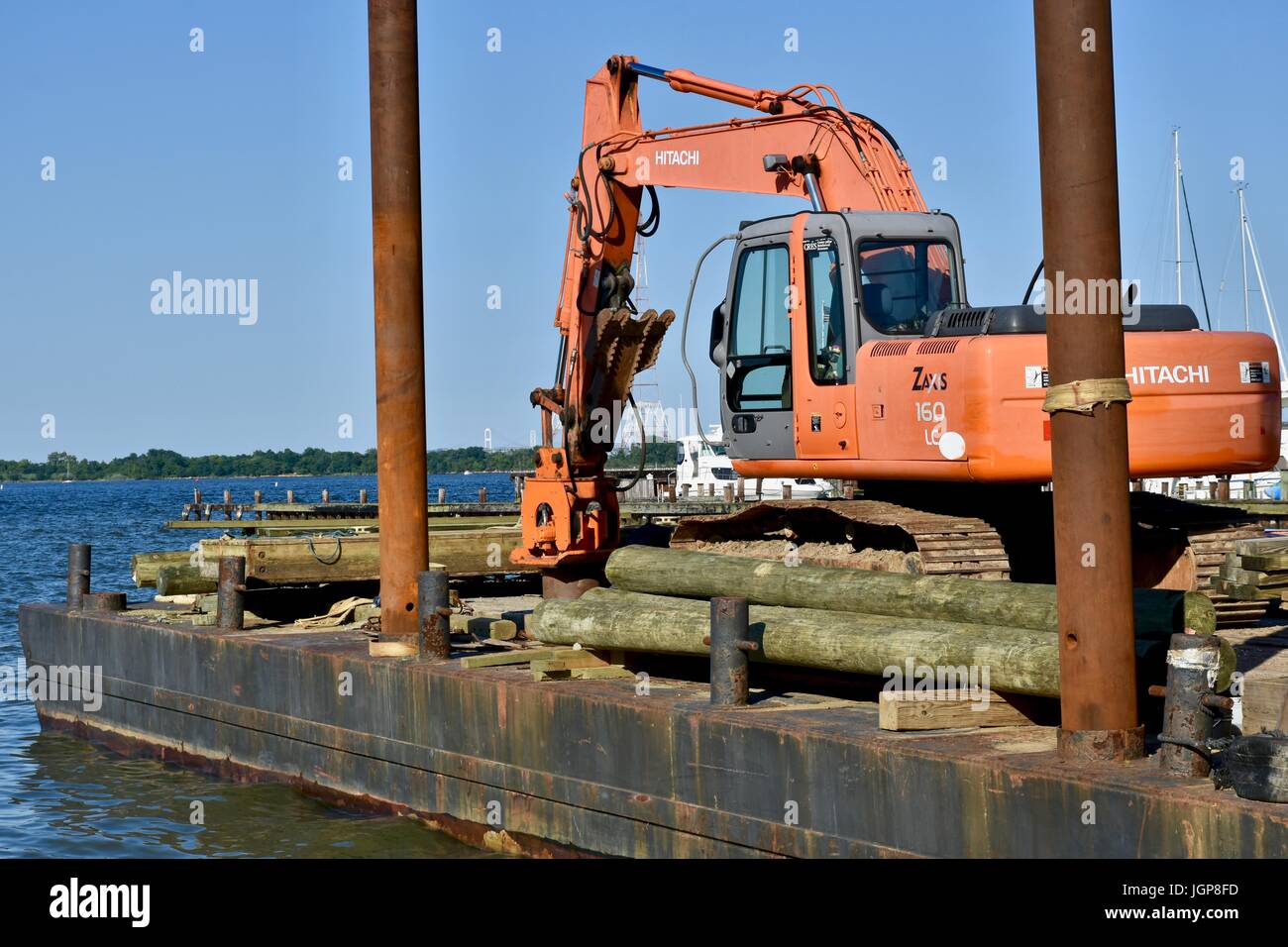 Backhoe on barge hi-res stock photography and images - Alamy