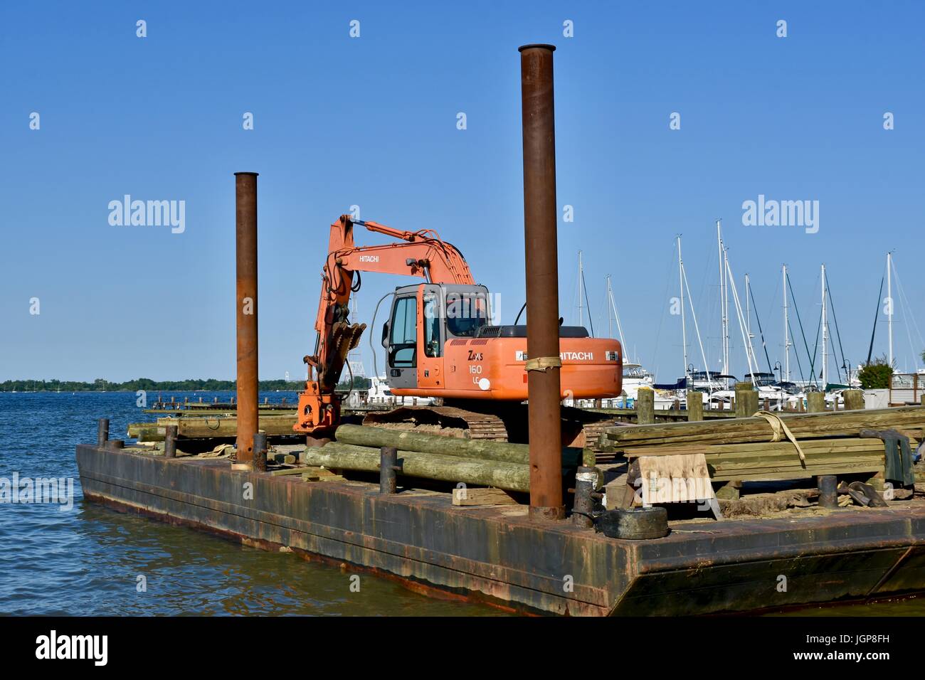 Backhoe on barge hi-res stock photography and images - Alamy
