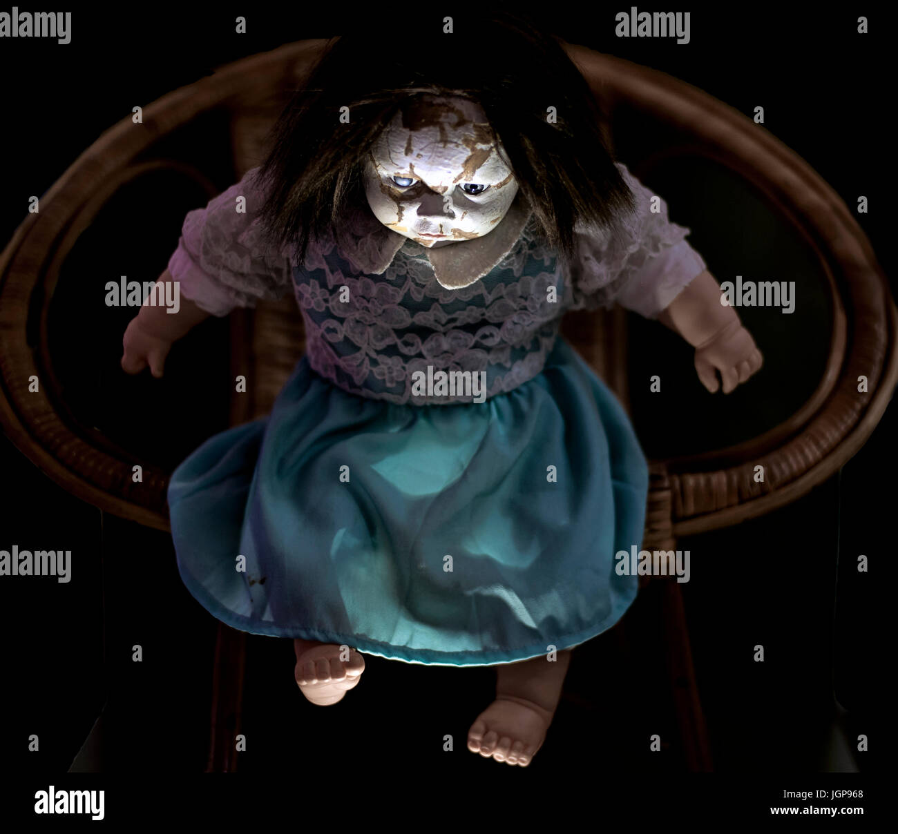 Scary doll in spooky light Stock Photo - Alamy