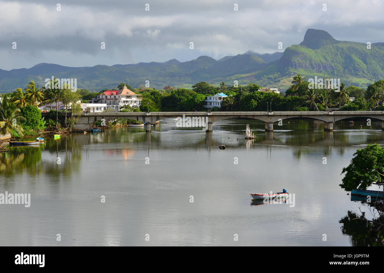 Mahebourg, Mauritius - Jan 4, 2017. A bridge with mountains background ...