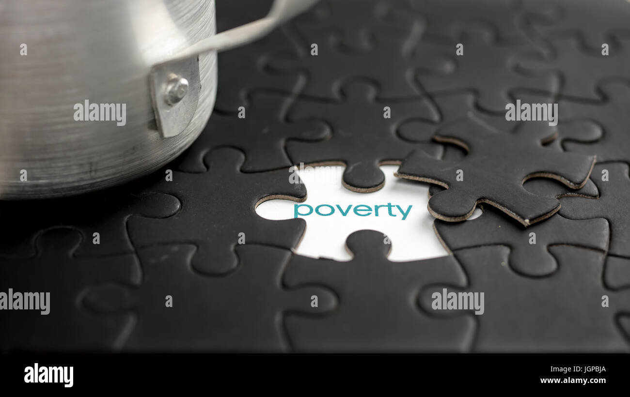 Word poverty under jigsaw puzzle piece Stock Photo - Alamy