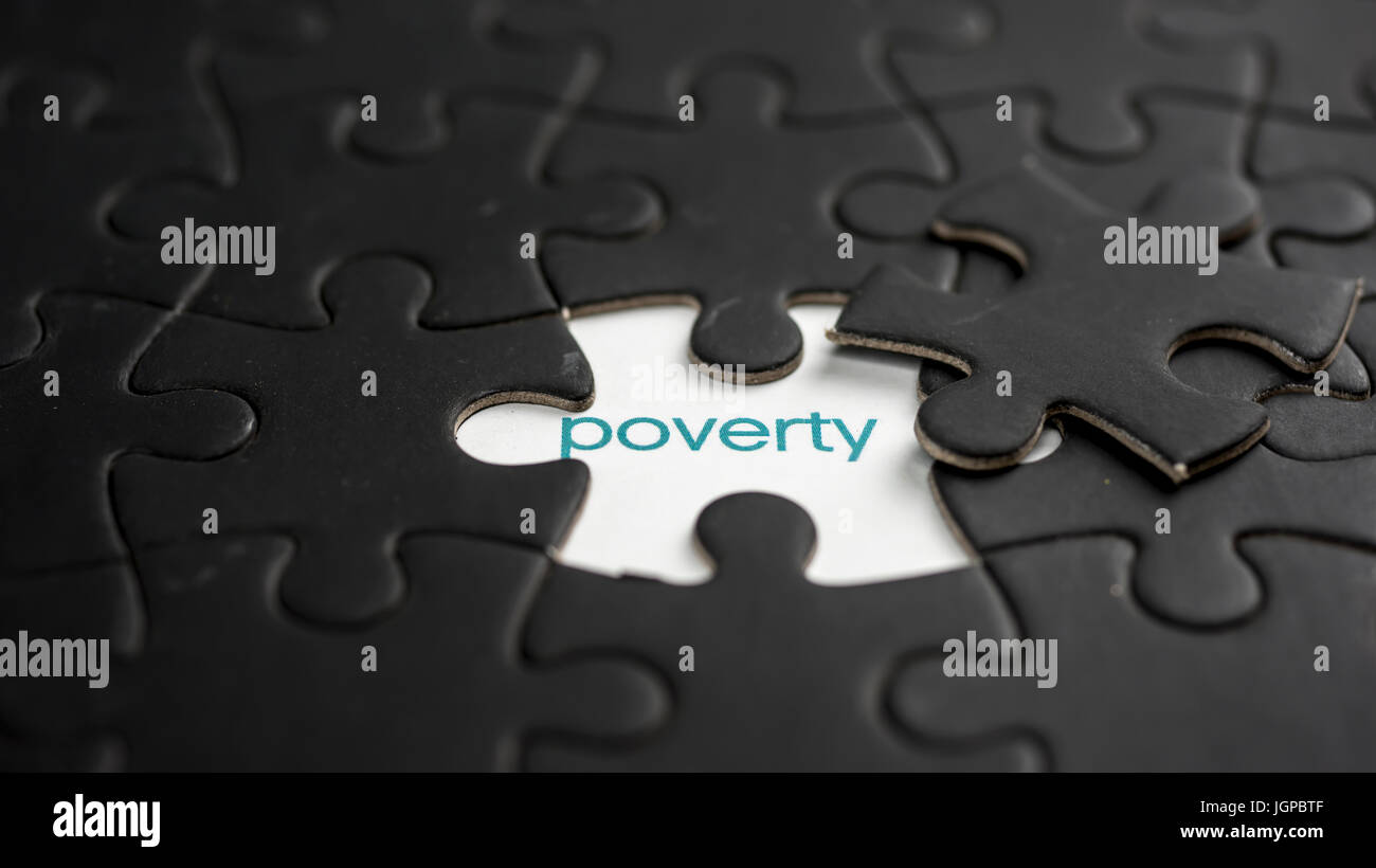 Word poverty under jigsaw puzzle piece Stock Photo - Alamy