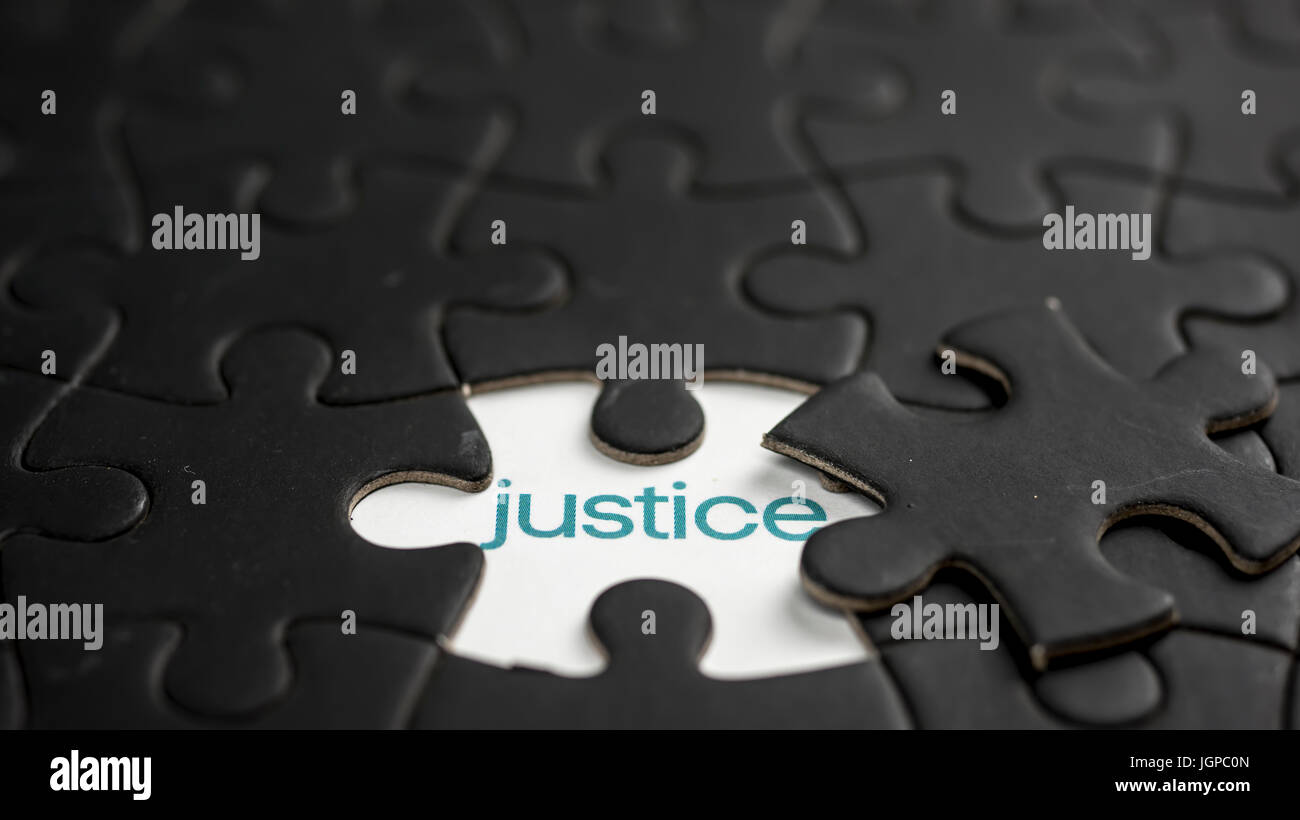 Word justice under jigsaw puzzle piece Stock Photo - Alamy