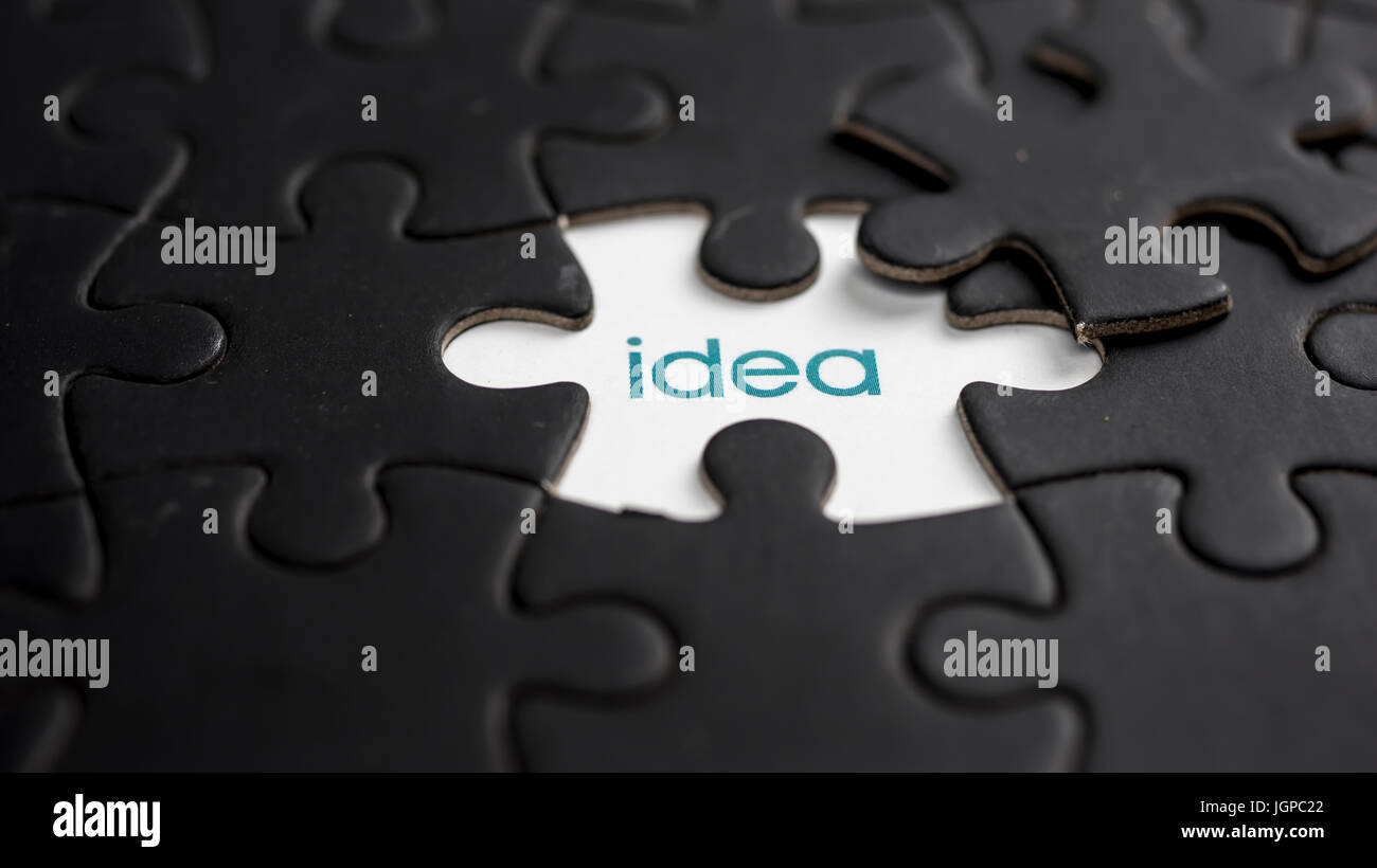 Word idea under jigsaw puzzle piece Stock Photo - Alamy