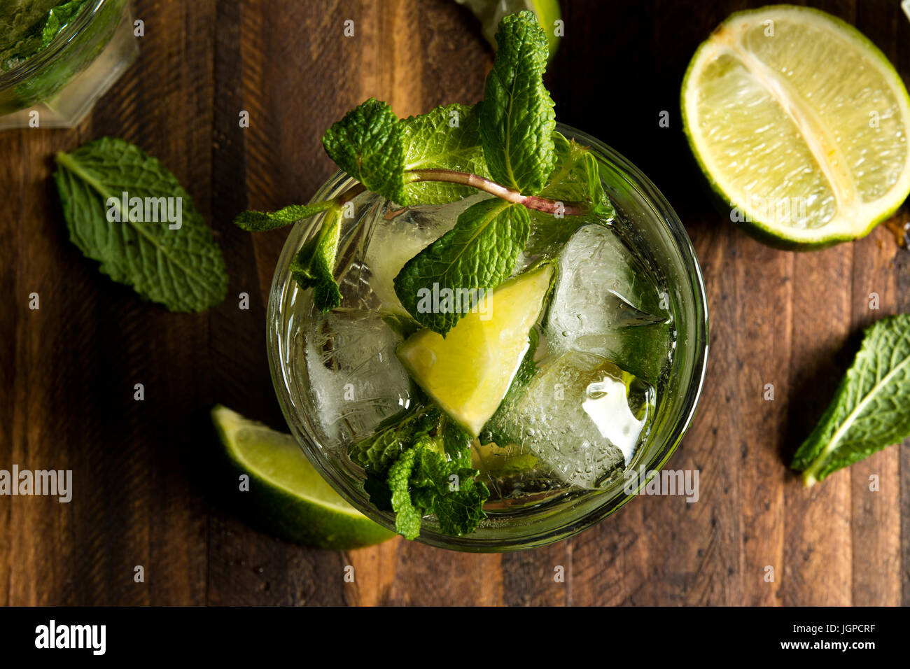 mojito cocktail with rum, lime and soda, garnished with mint, from ...