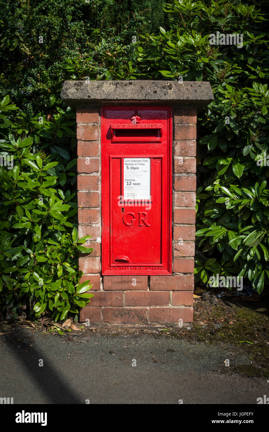 Red Post Box in Radcliffe, Manchester Stock Photo - Alamy