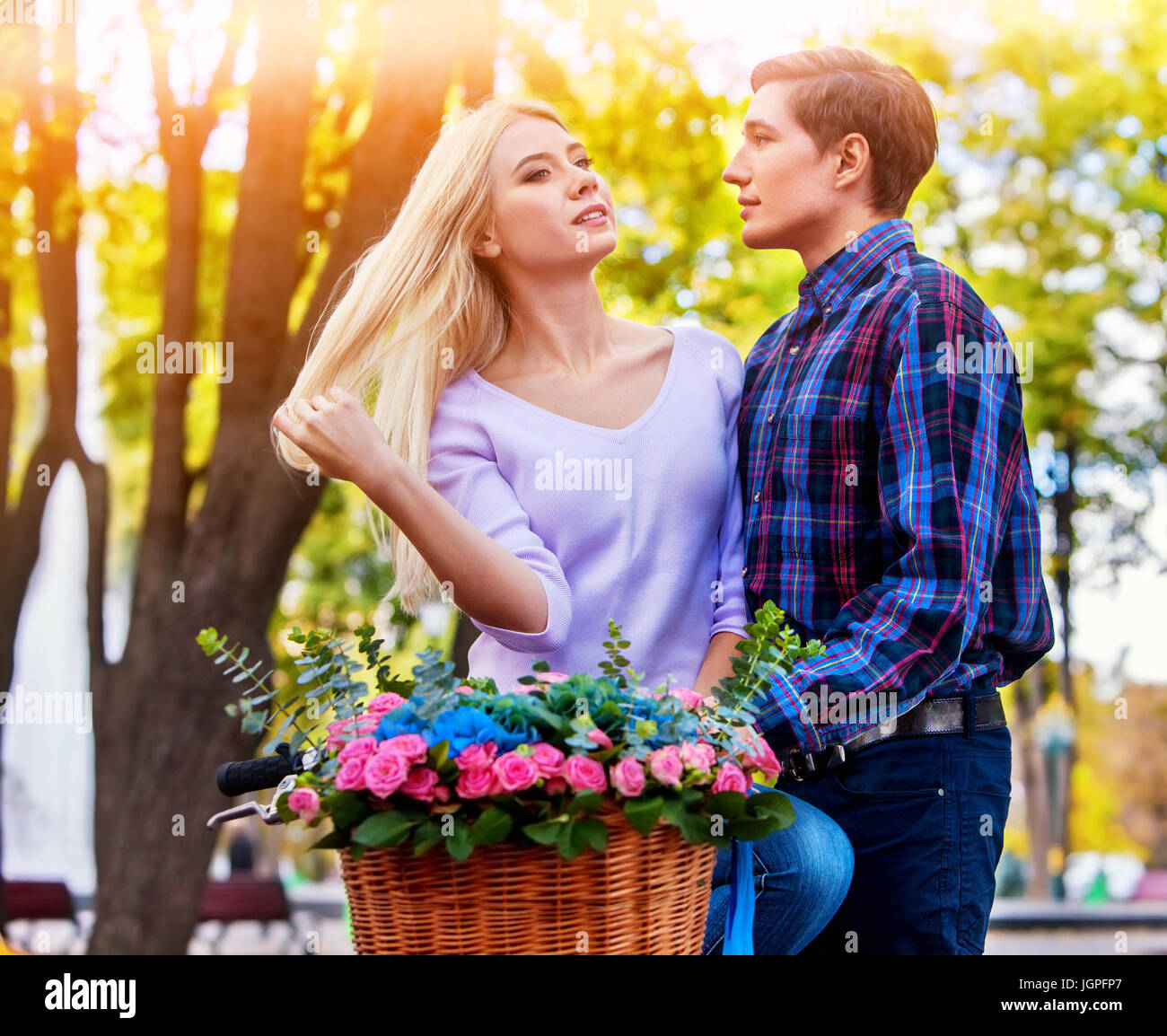 Spring couple walking park. Summer friends walk outdoor Stock Photo - Alamy