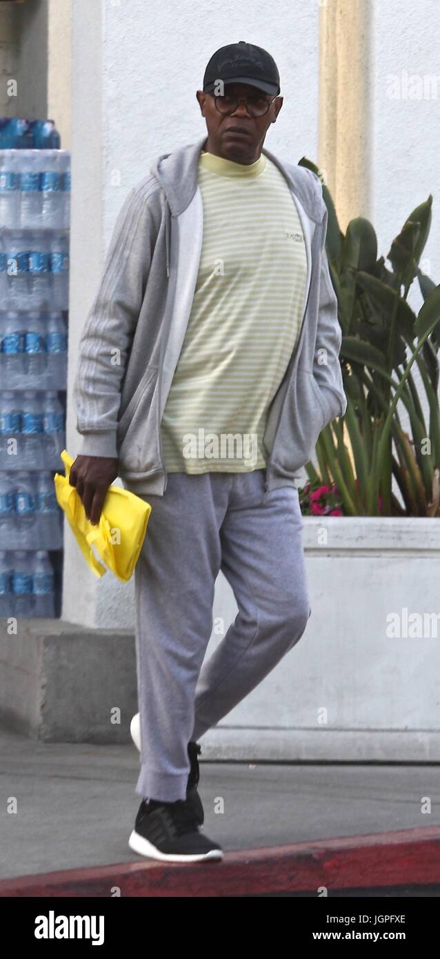 Samuel L. Jackson leaves Bristol Farms carrying a yellow bag Featuring ...