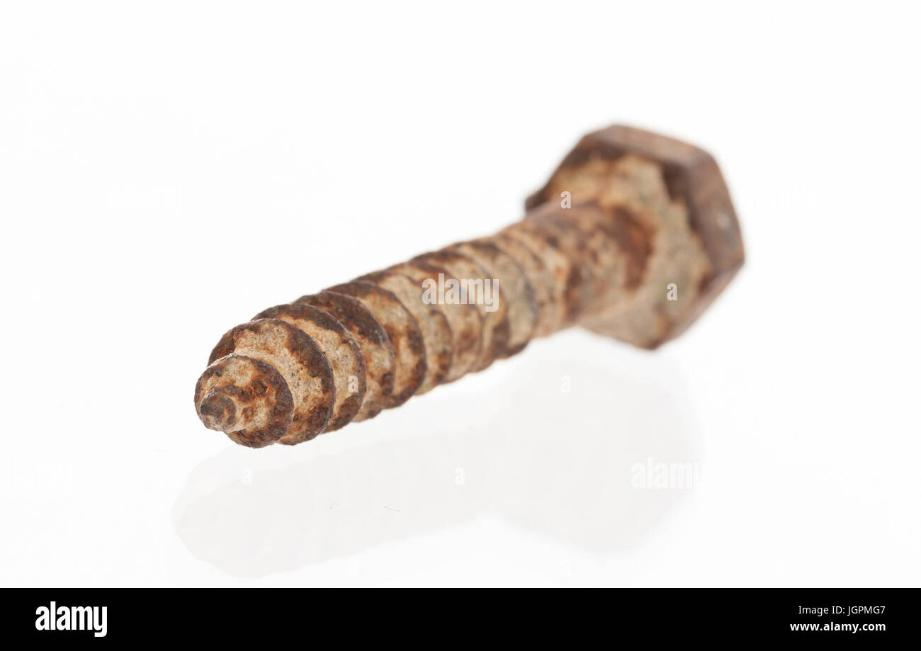 Rusted old screw isolated on white background Stock Photo - Alamy