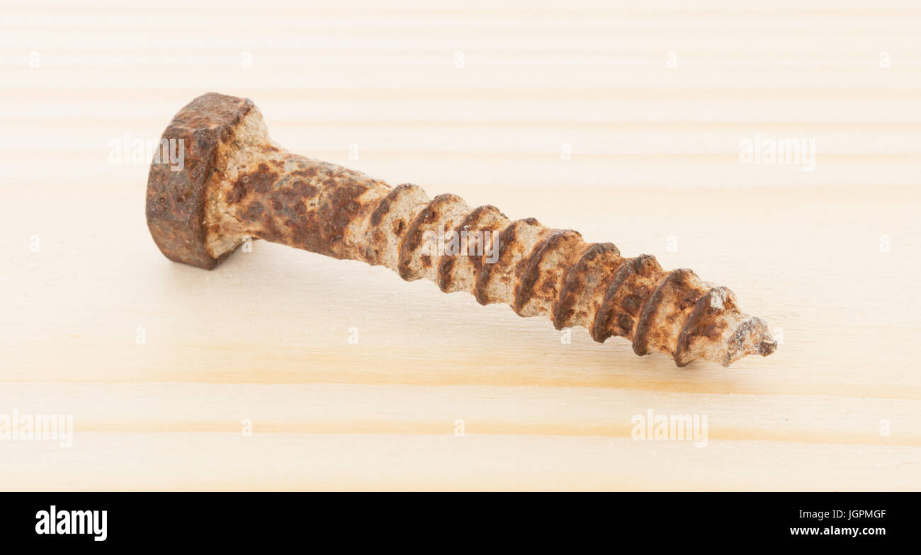 Rusted old screw isolated on white background Stock Photo - Alamy