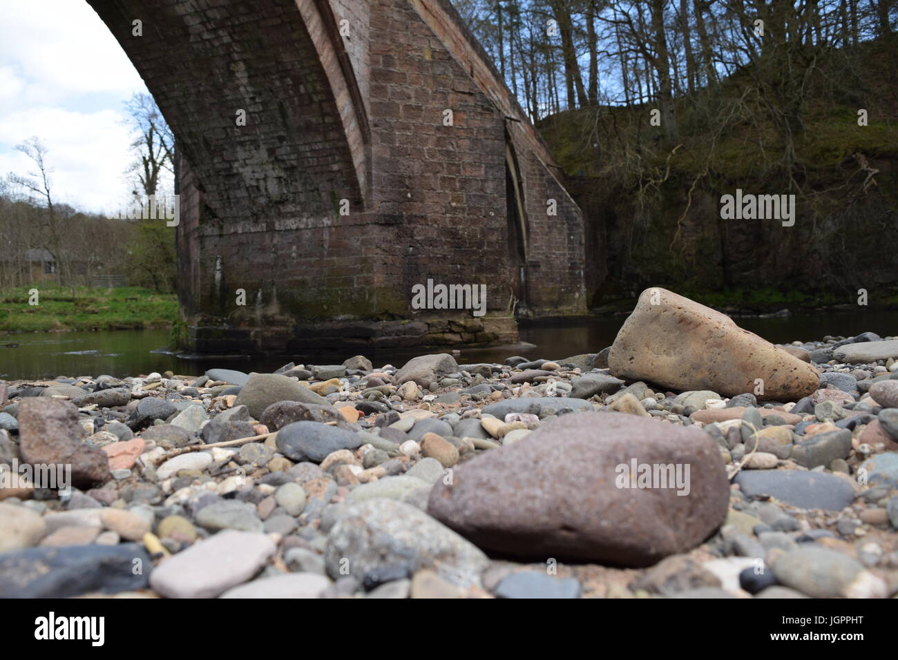 Arch over a river Stock Photo - Alamy