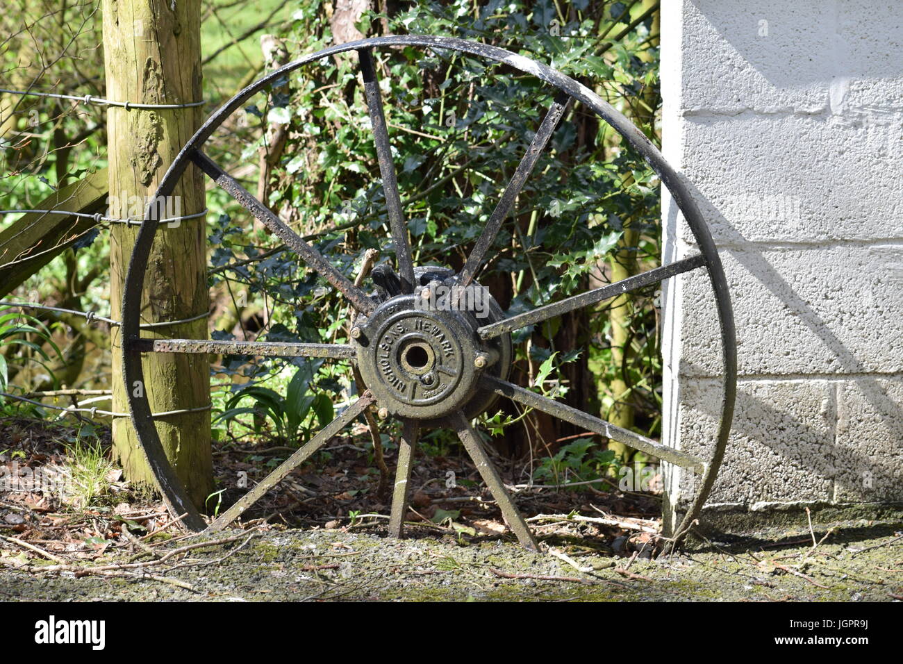 Black carriage wheel Stock Photo - Alamy