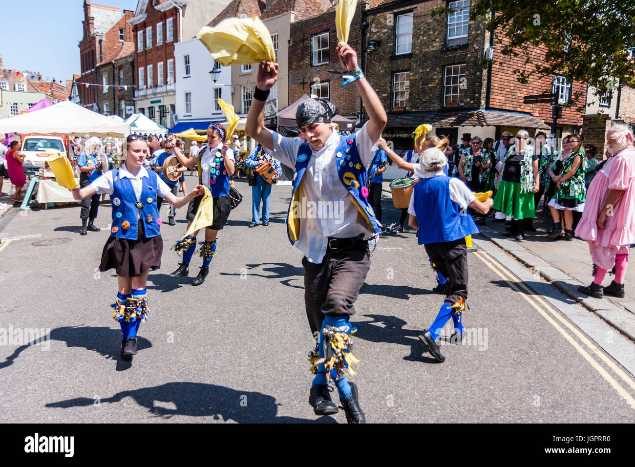 Traditional English folk dancers, Royal Liberty Morris side dancing and ...