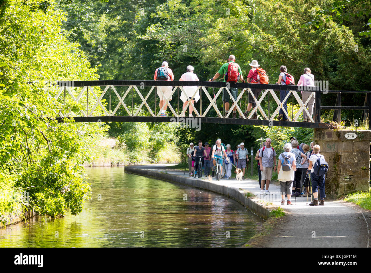 People walking along the Llangollen Canal toe path on a sunny summers ...