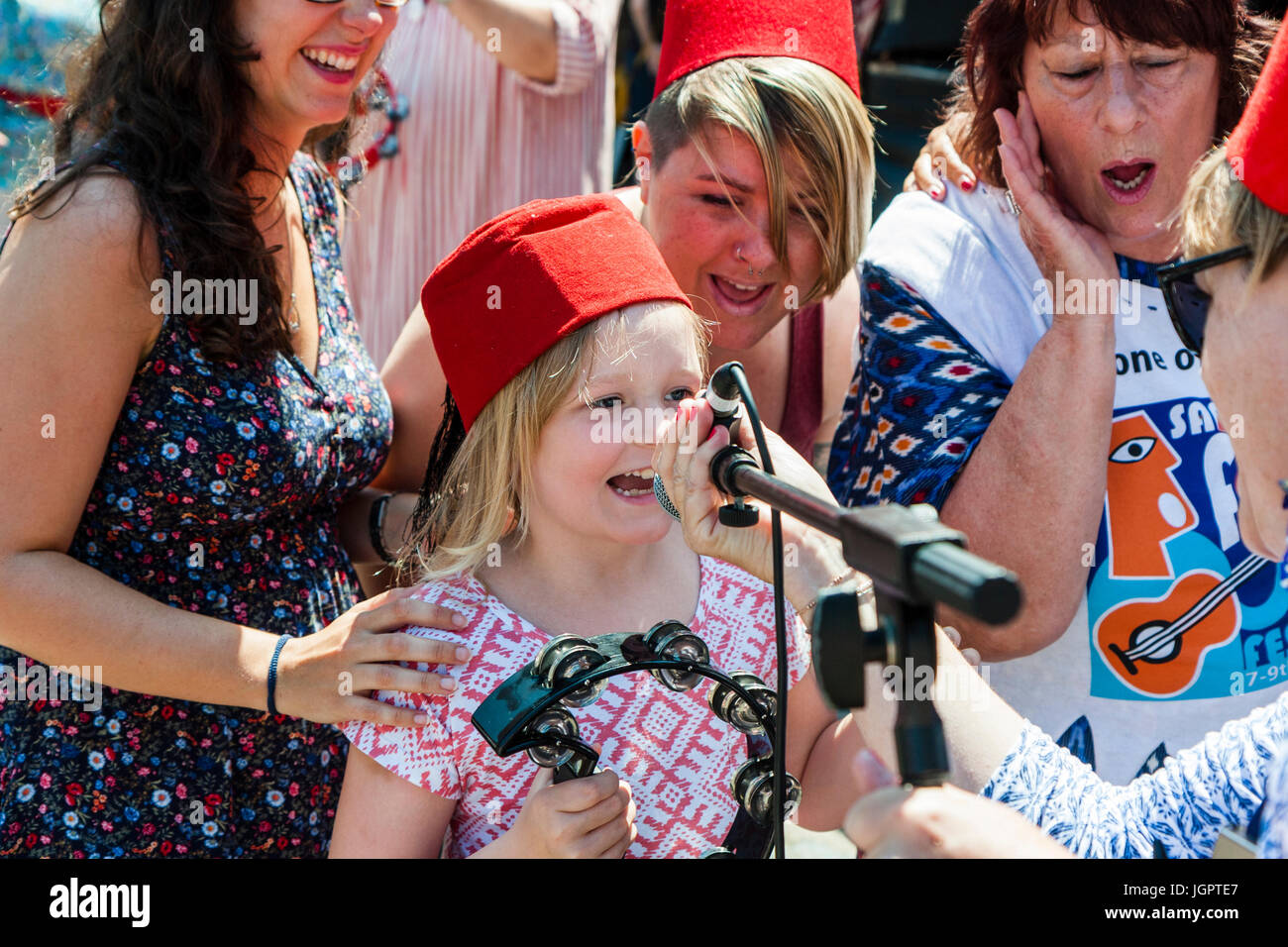 Girl with a tambourine hi-res stock photography and images - Alamy