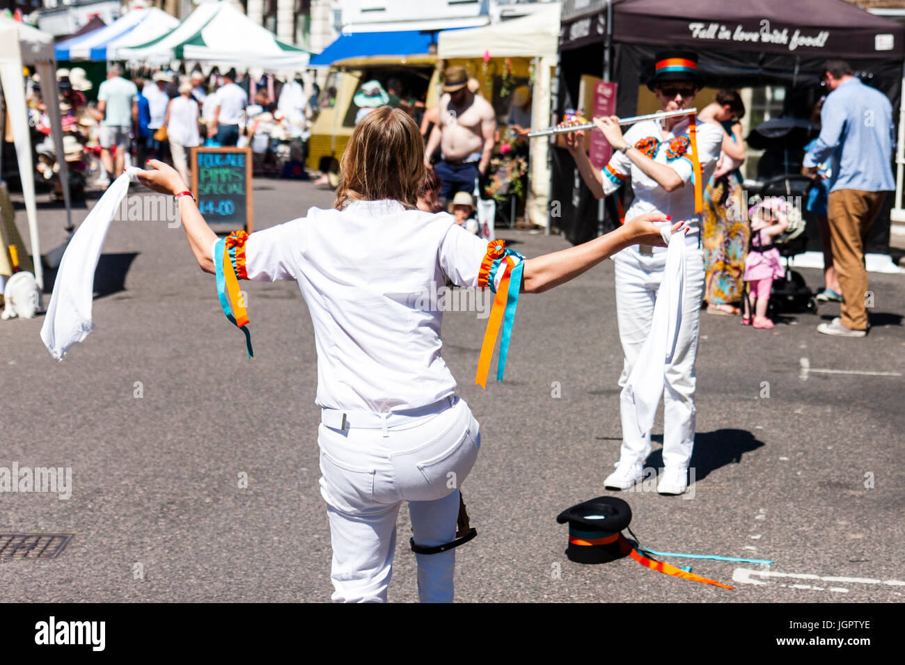English traditional folk dancing. Lone teenage woman Morris dancer ...