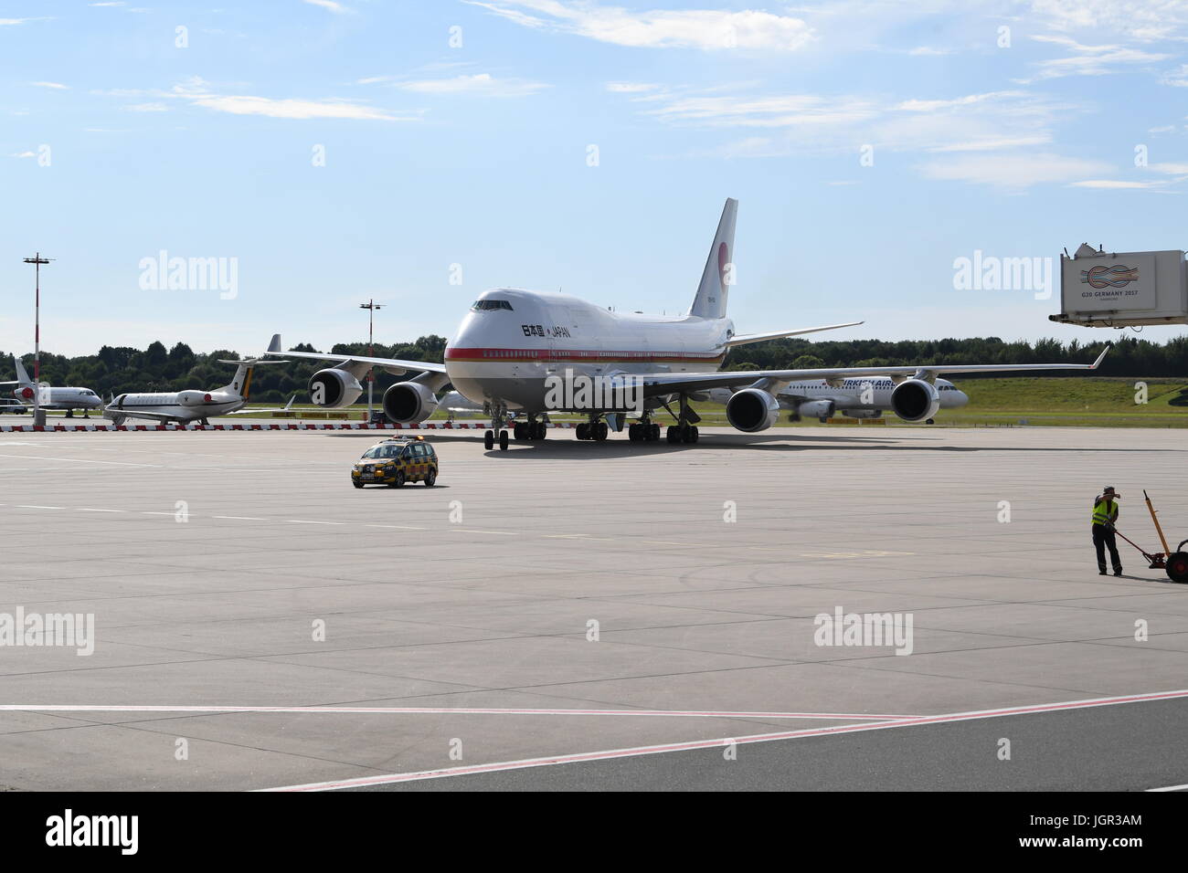 The airplane of the Japanese head of state arrives to the G20 Summit in ...
