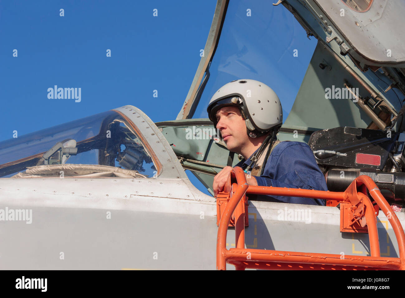 Military pilot in the cockpit of a jet aircraft Stock Photo - Alamy