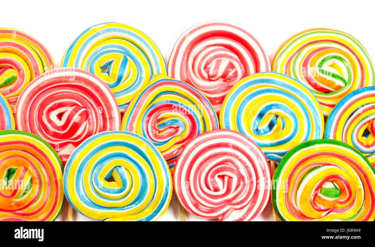 Colorful lollipops on white Stock Photo - Alamy
