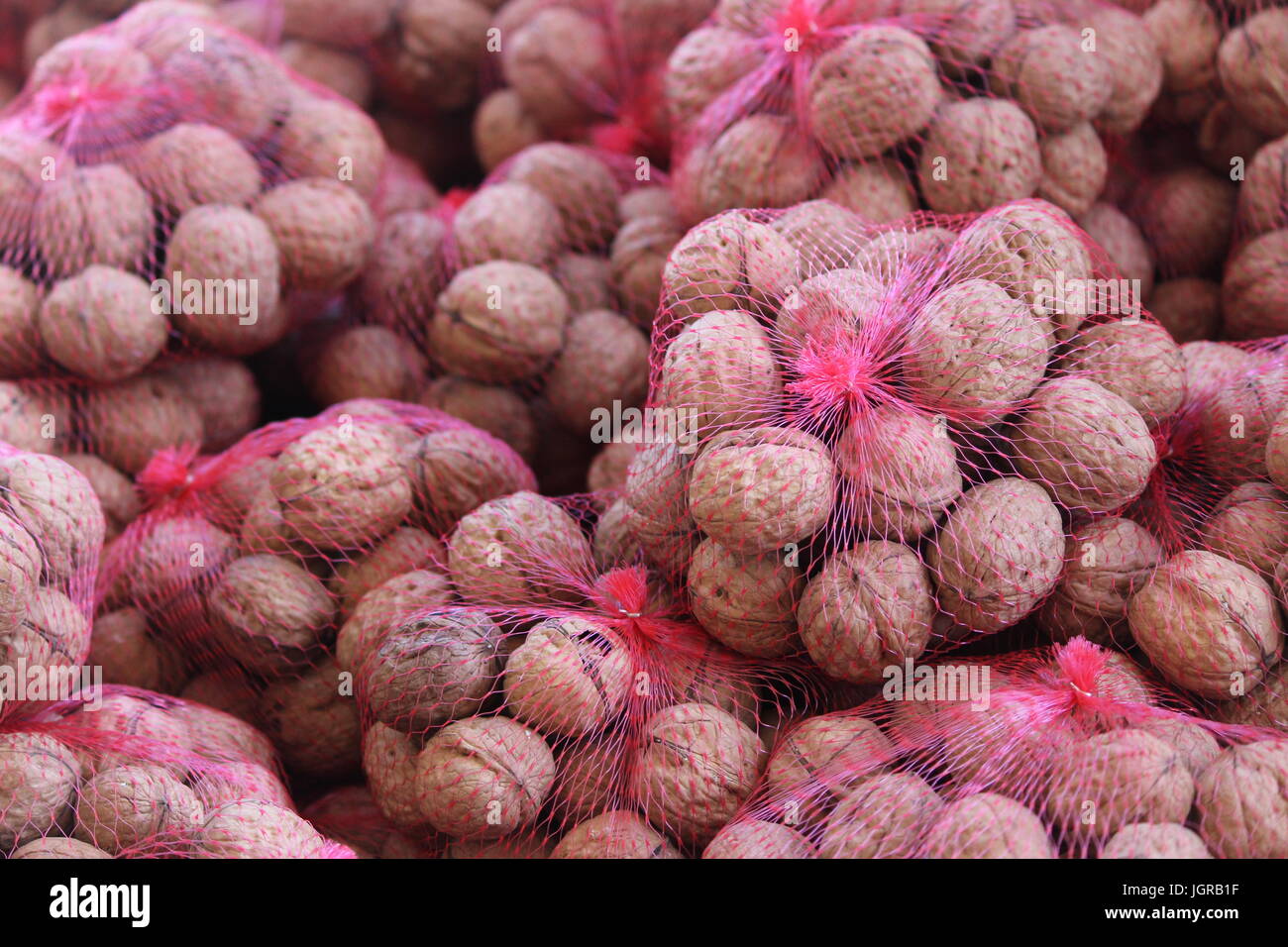 walnuts on display at market Stock Photo - Alamy