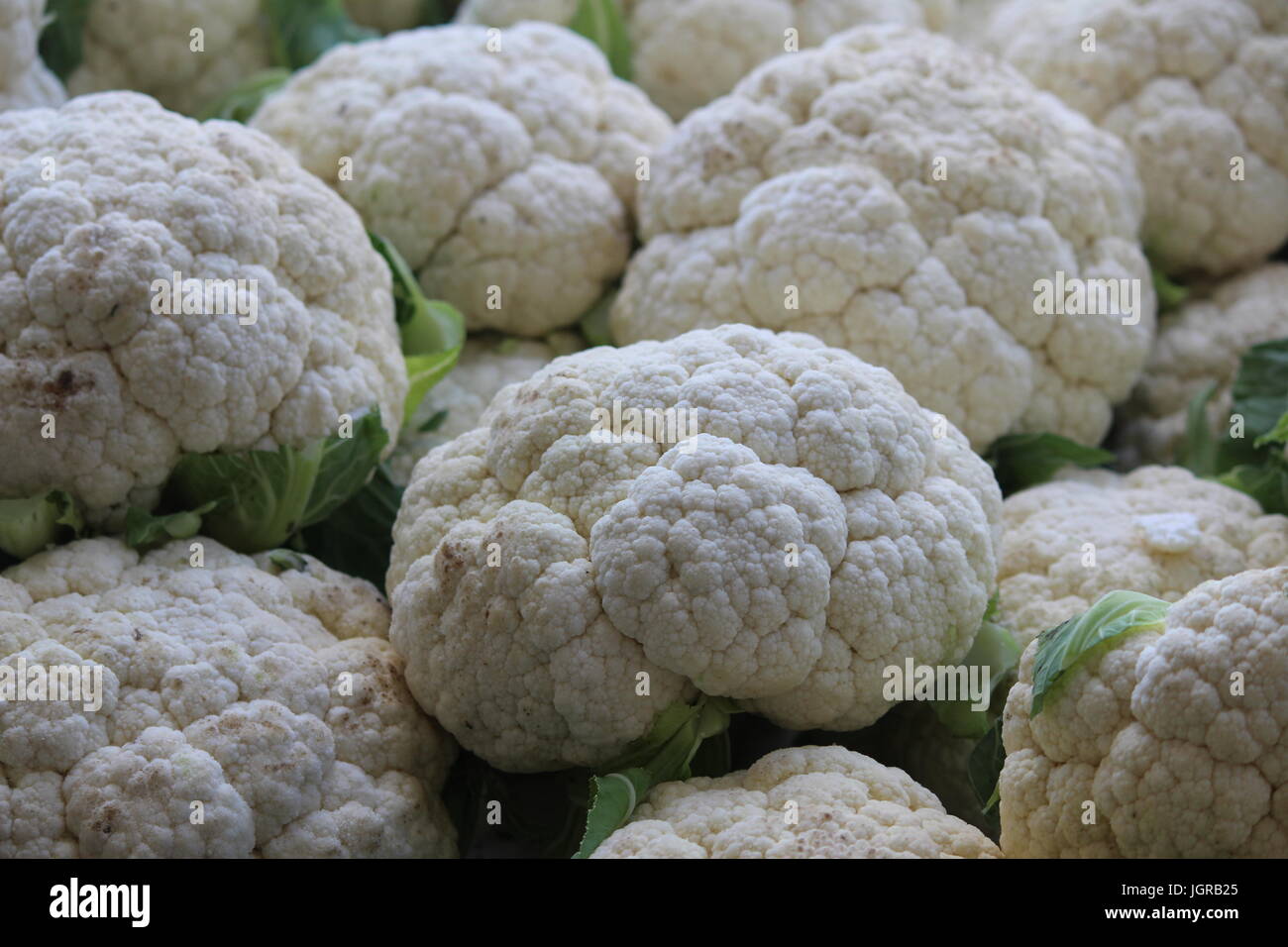 cauliflower on display at market Stock Photo - Alamy