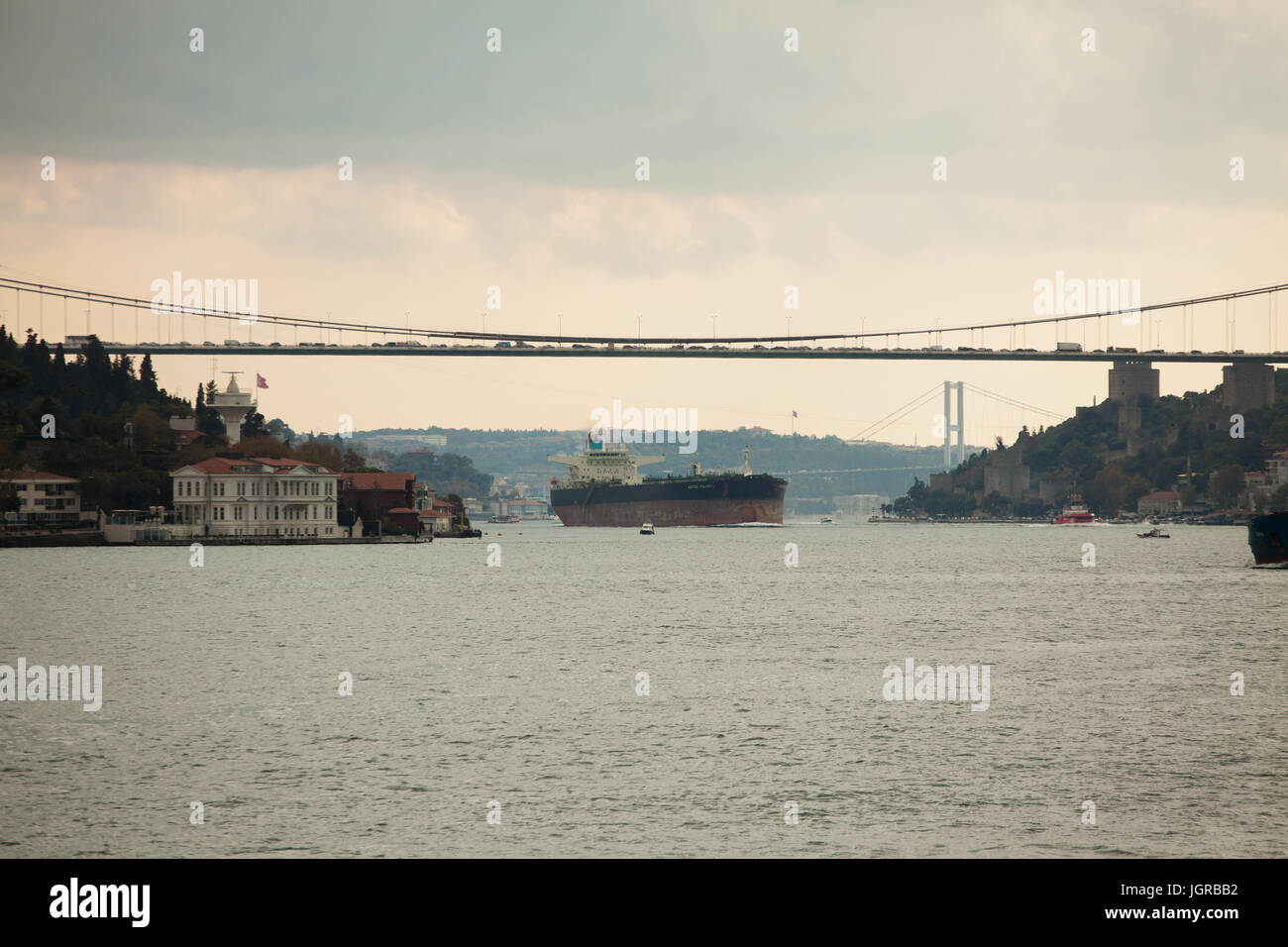 Industrial ship passing Bosphorus strait, Istanbul, Turkey; First and ...