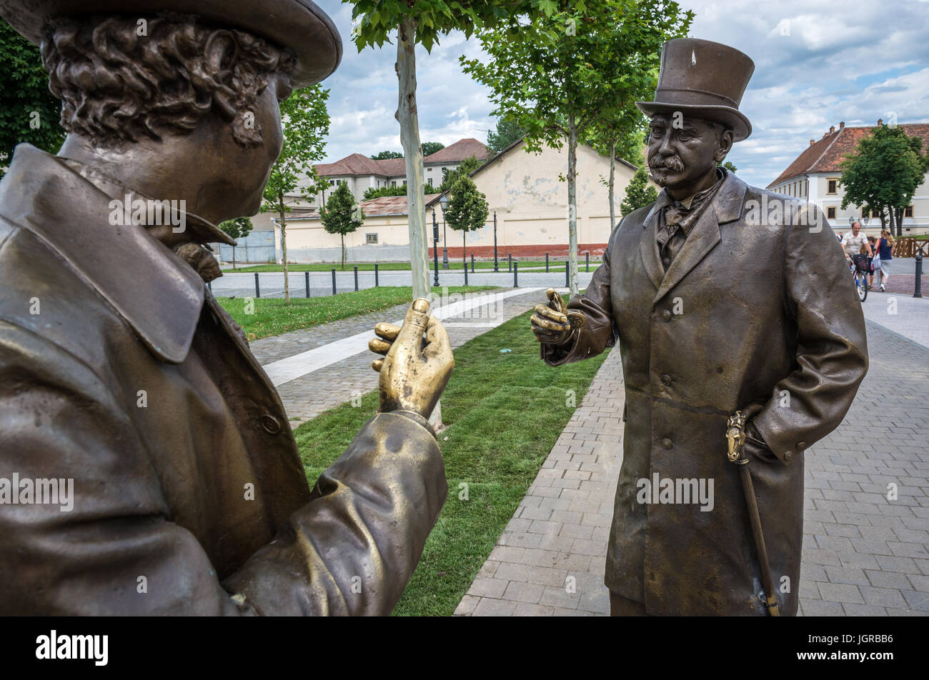 Bronze statues of talking men in Alba Carolina Fortress in Alba Iulia ...