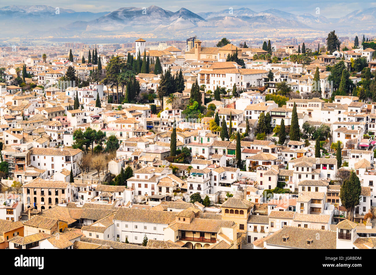 Panoramic view of Granada city against mountains, Andalusia, Spain ...