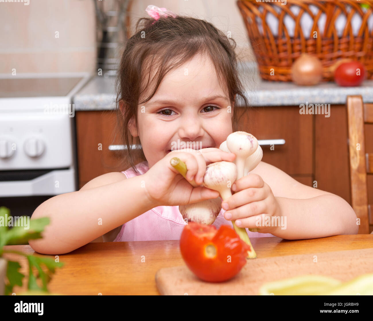 Children at the table with with fresh fruits and vegetables, home ...