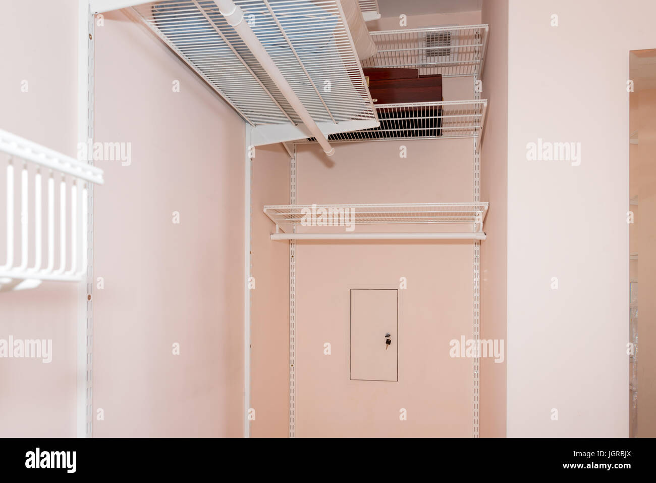 Empty walk-in closet with shelves. Dressing room Interior elements ...