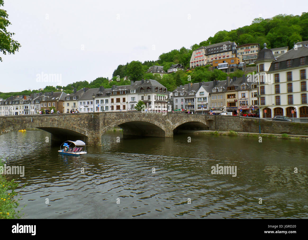 The old stone bridge over Semois river in the heart of Bouillon ...