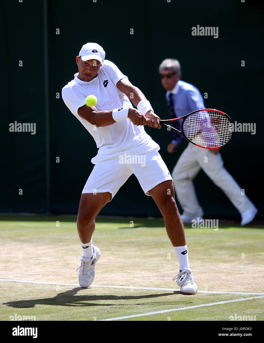 Jay Clarke in action during his doubles match with Marcus Willis on day ...