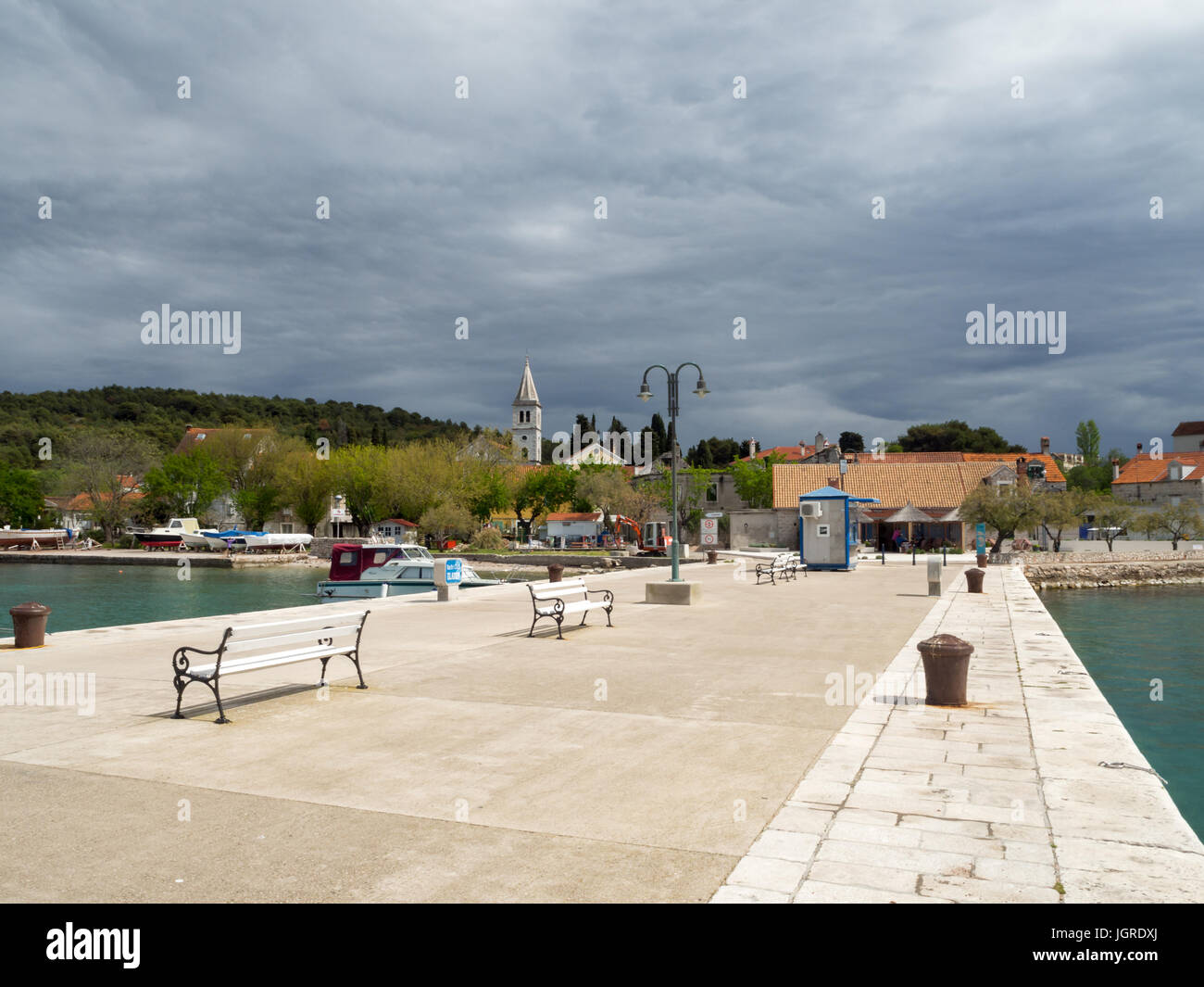 Town pier in Zlarin island in Croatia, port marine with yachts and ...