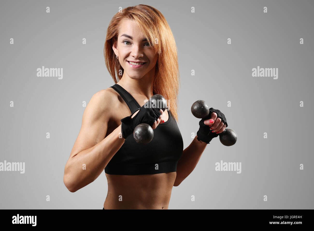 Sport. Beautiful woman in the gym Stock Photo - Alamy