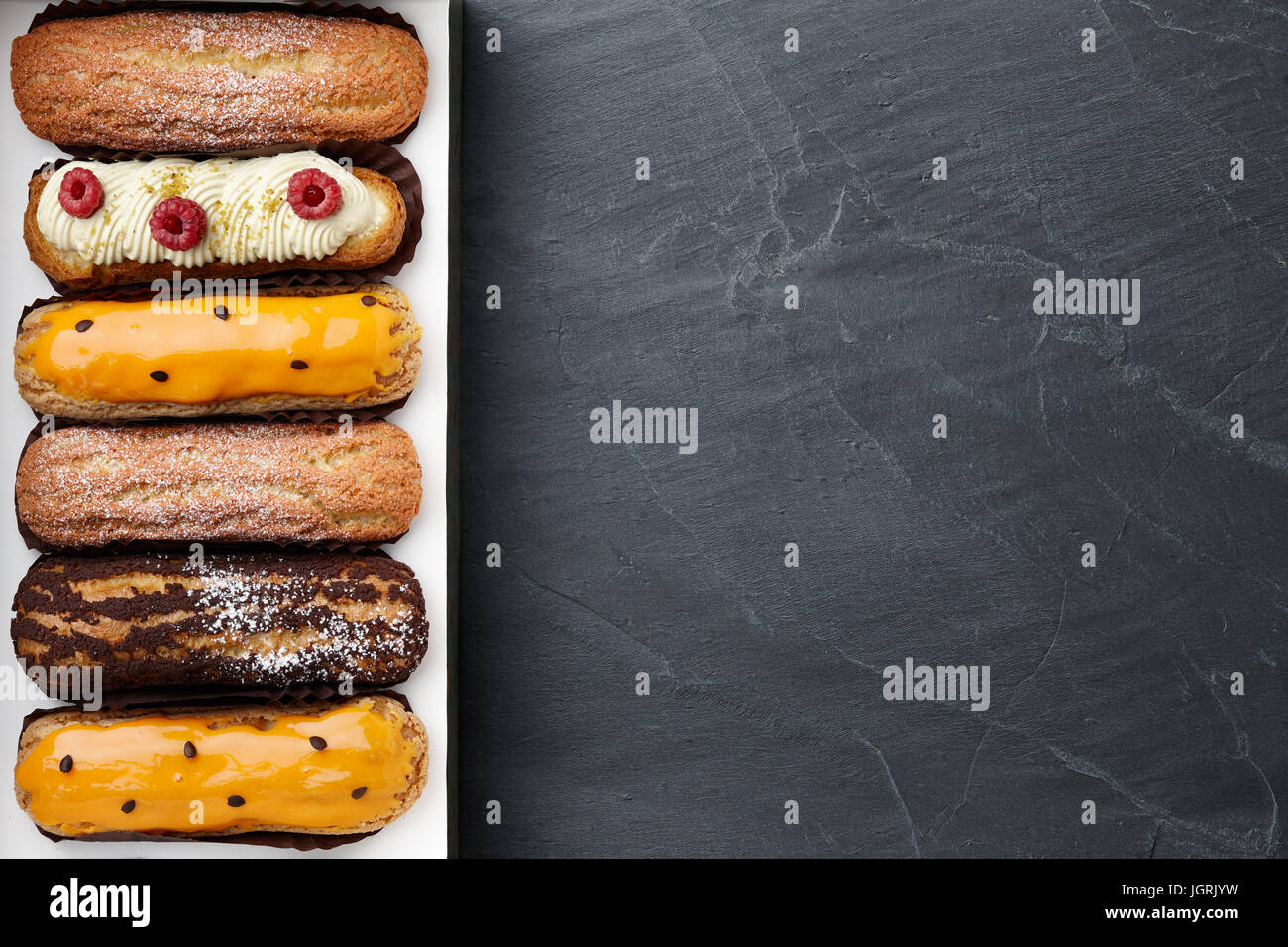 Box of french eclairs Stock Photo - Alamy