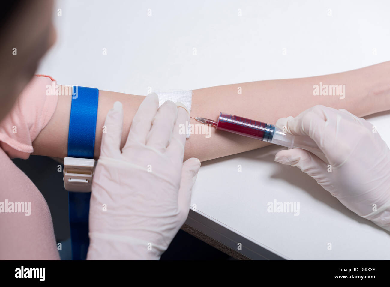 cropped shot of doctor doing blood test from vein of patient Stock ...