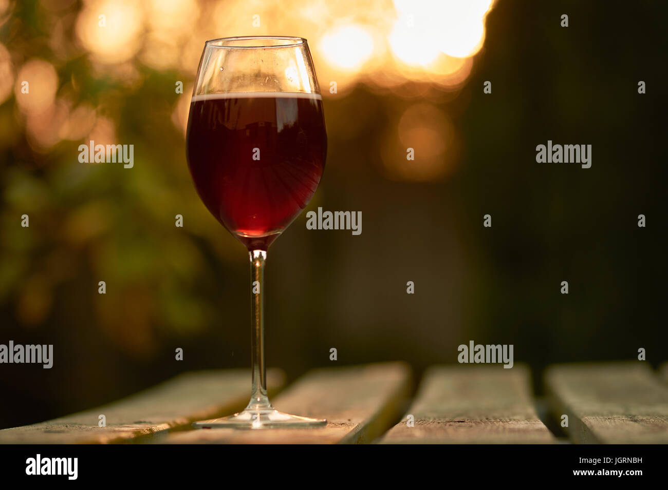 Glass of Red Wine in sunlight Stock Photo - Alamy
