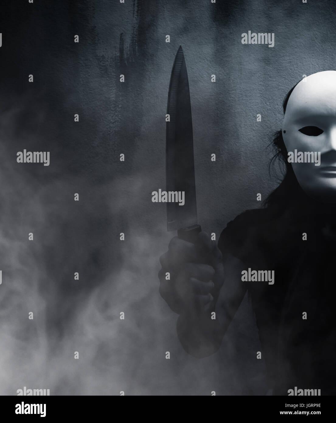 Mysterious woman in black wearing white mask with knife,Scary ...