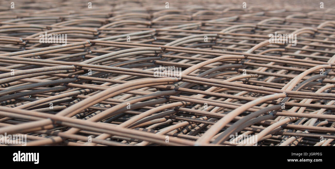 Stack of the metal reinforcement bars mesh for construction ; selective ...