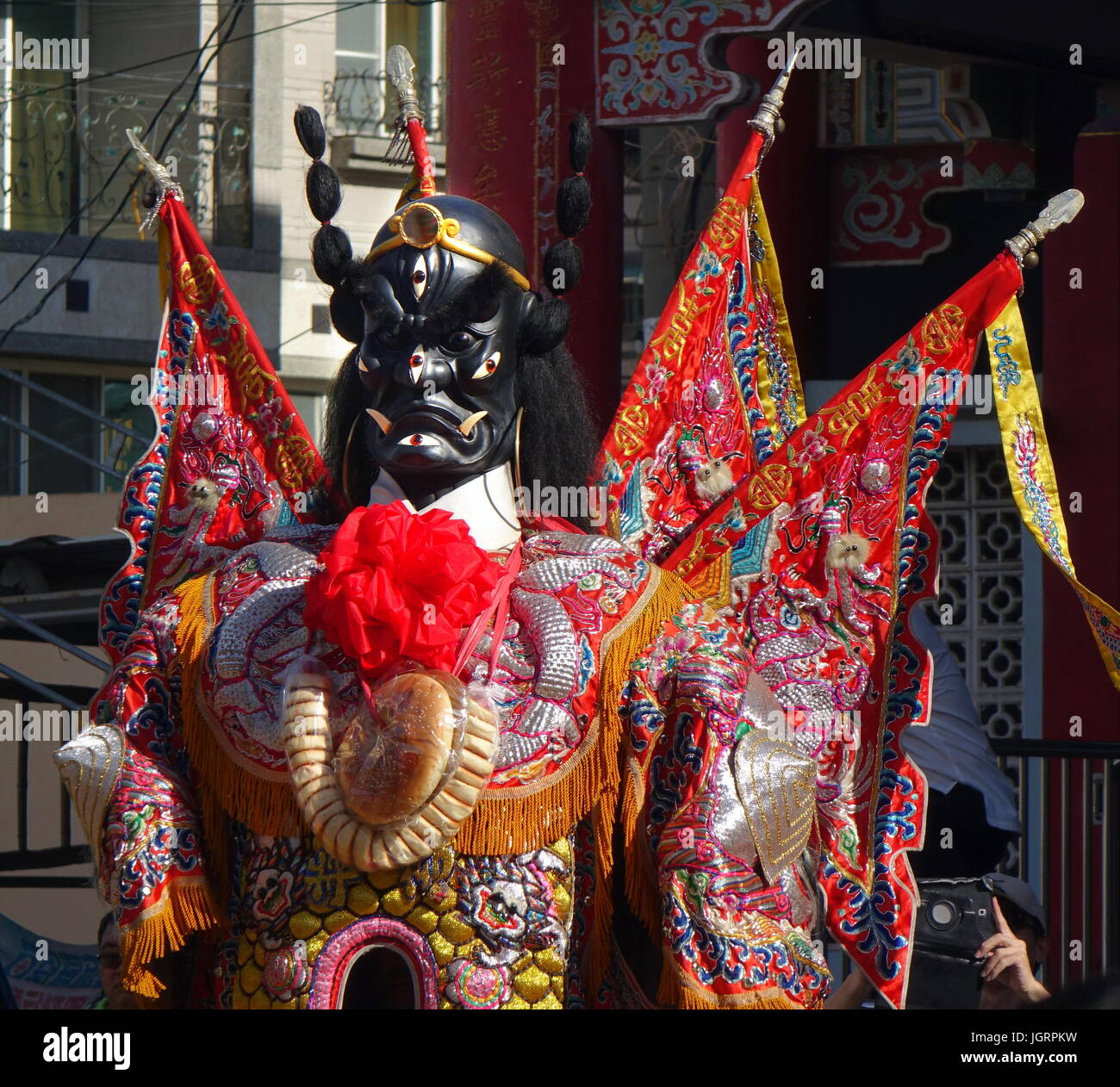 KAOHSIUNG, TAIWAN -- JUNE 10 , 2017: Dancers wear large elaborate masks ...