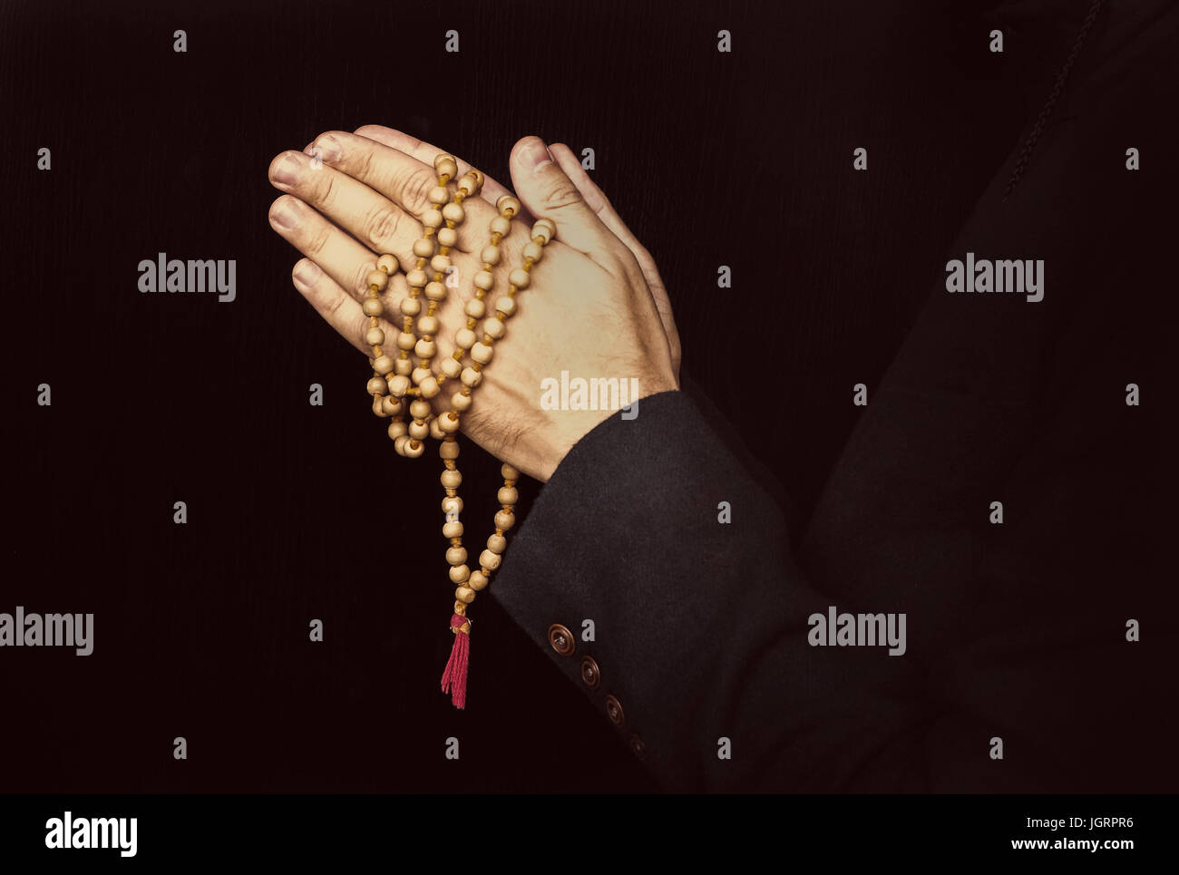 Prayer hands rosary hi-res stock photography and images - Alamy