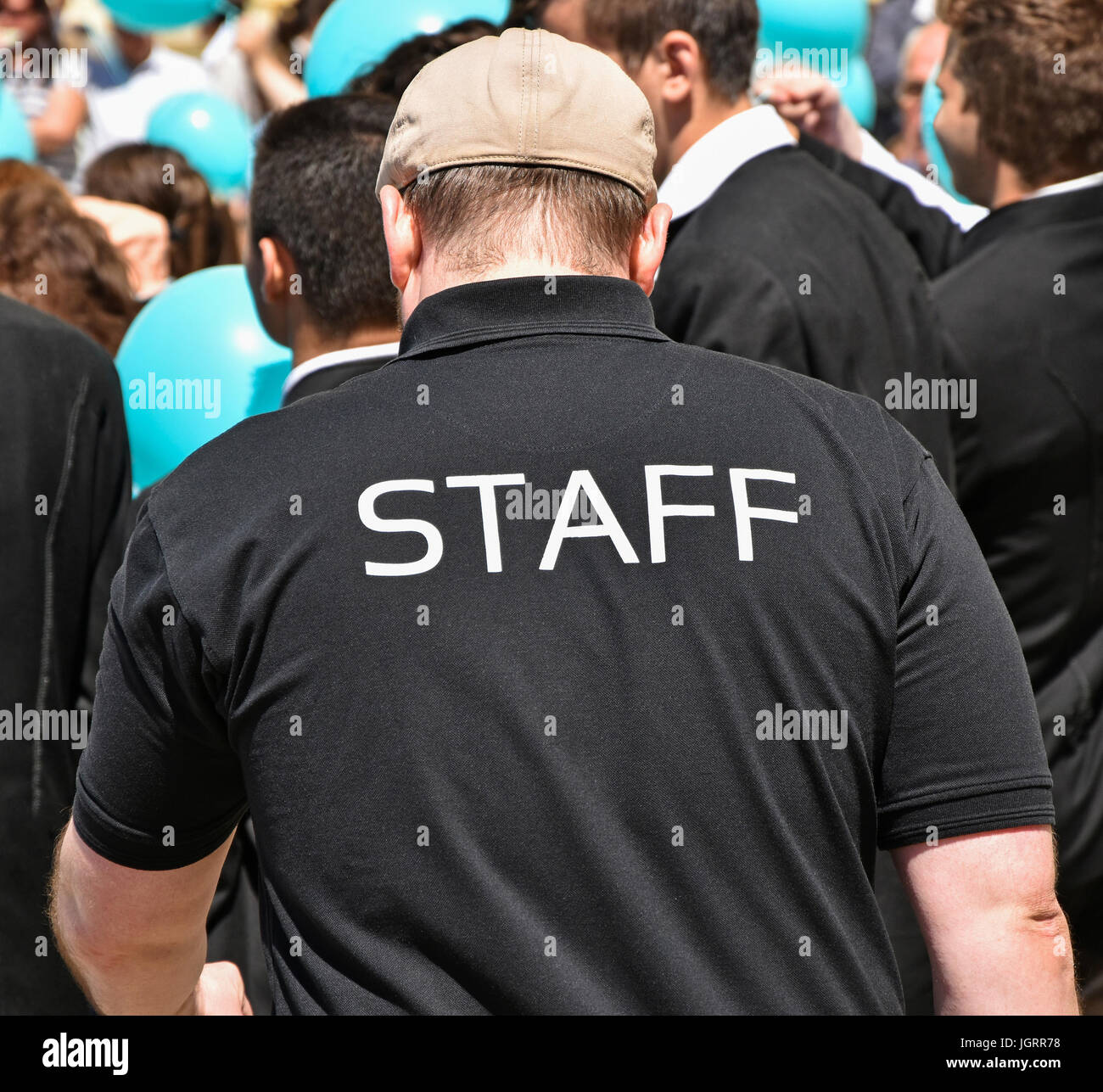 Staff member of an event Stock Photo - Alamy