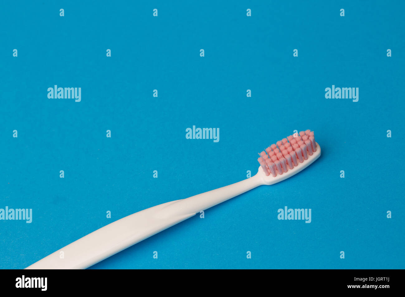 Photo of one pink toothbrush Stock Photo - Alamy