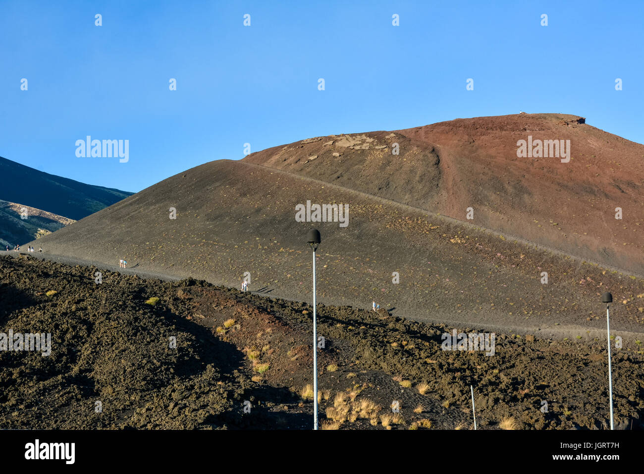 Mount Etna, Sicily, Italy - people walking in volcano in peace period ...