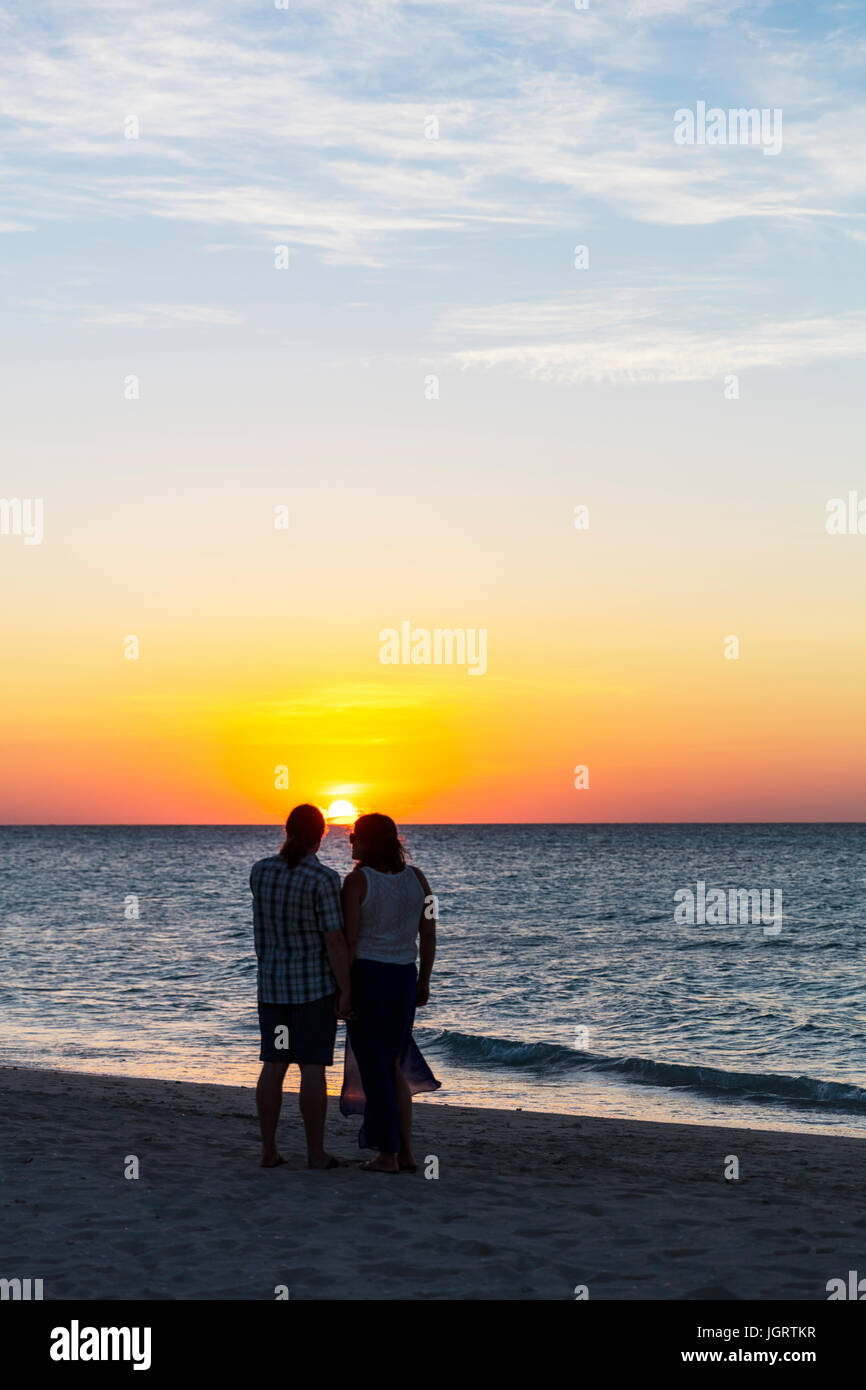 Watching sunset, beach sunset, lovers sunset, lovers watching sunset ...